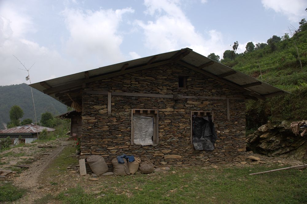 A one storey Bhutanese farmhouse in a rural village of the Lhops ...